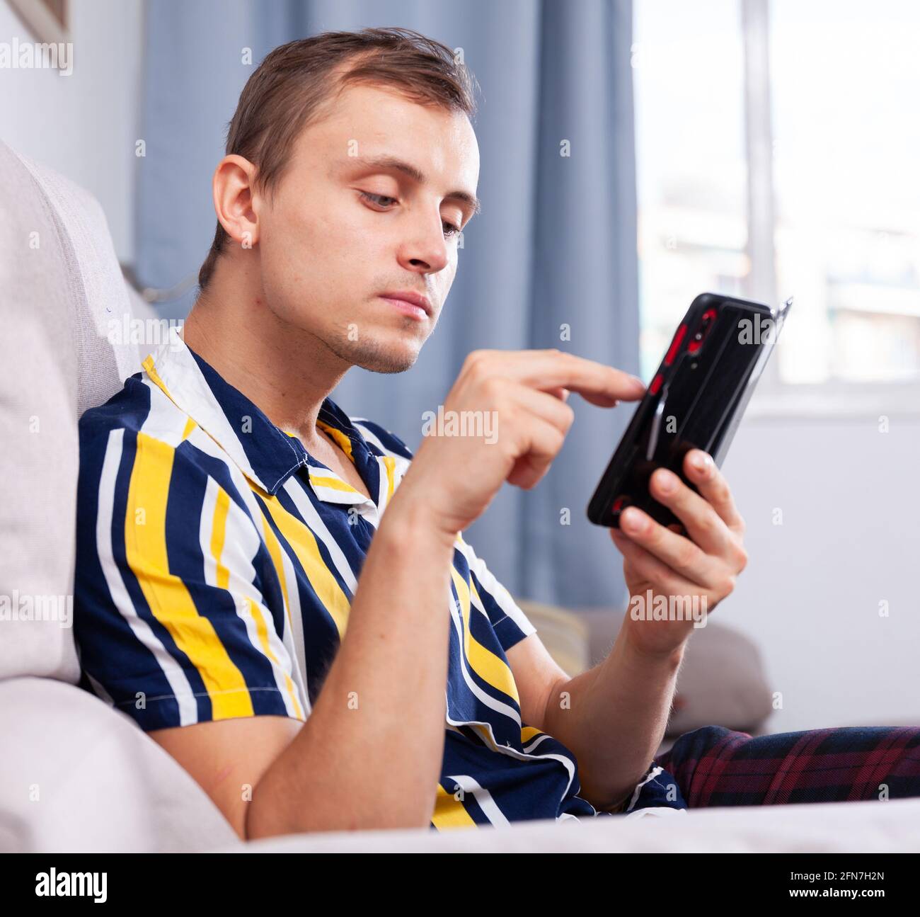 man in home Stock Photo - Alamy