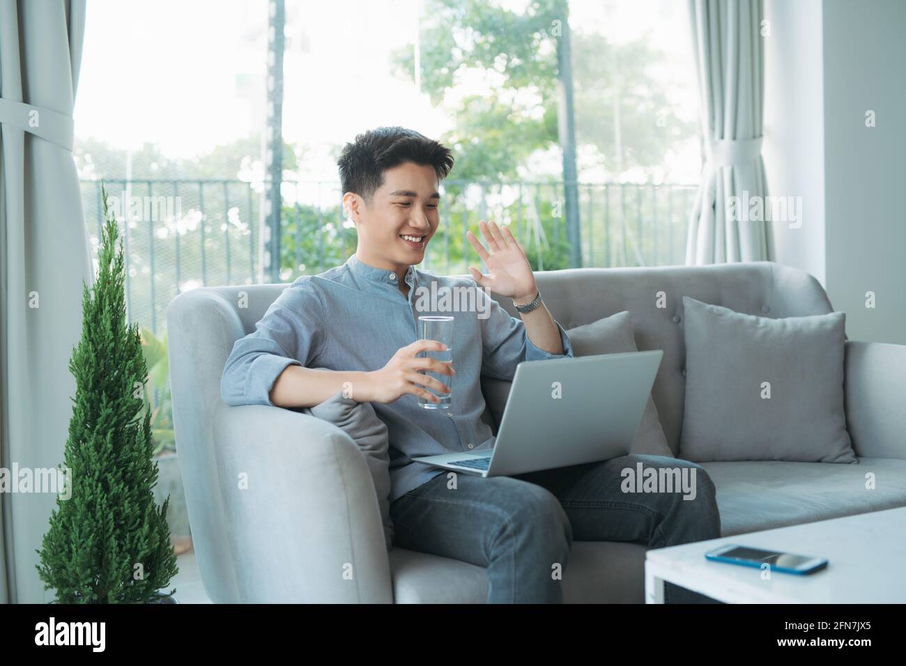 Teleworking sofa hi-res stock photography and images - Alamy