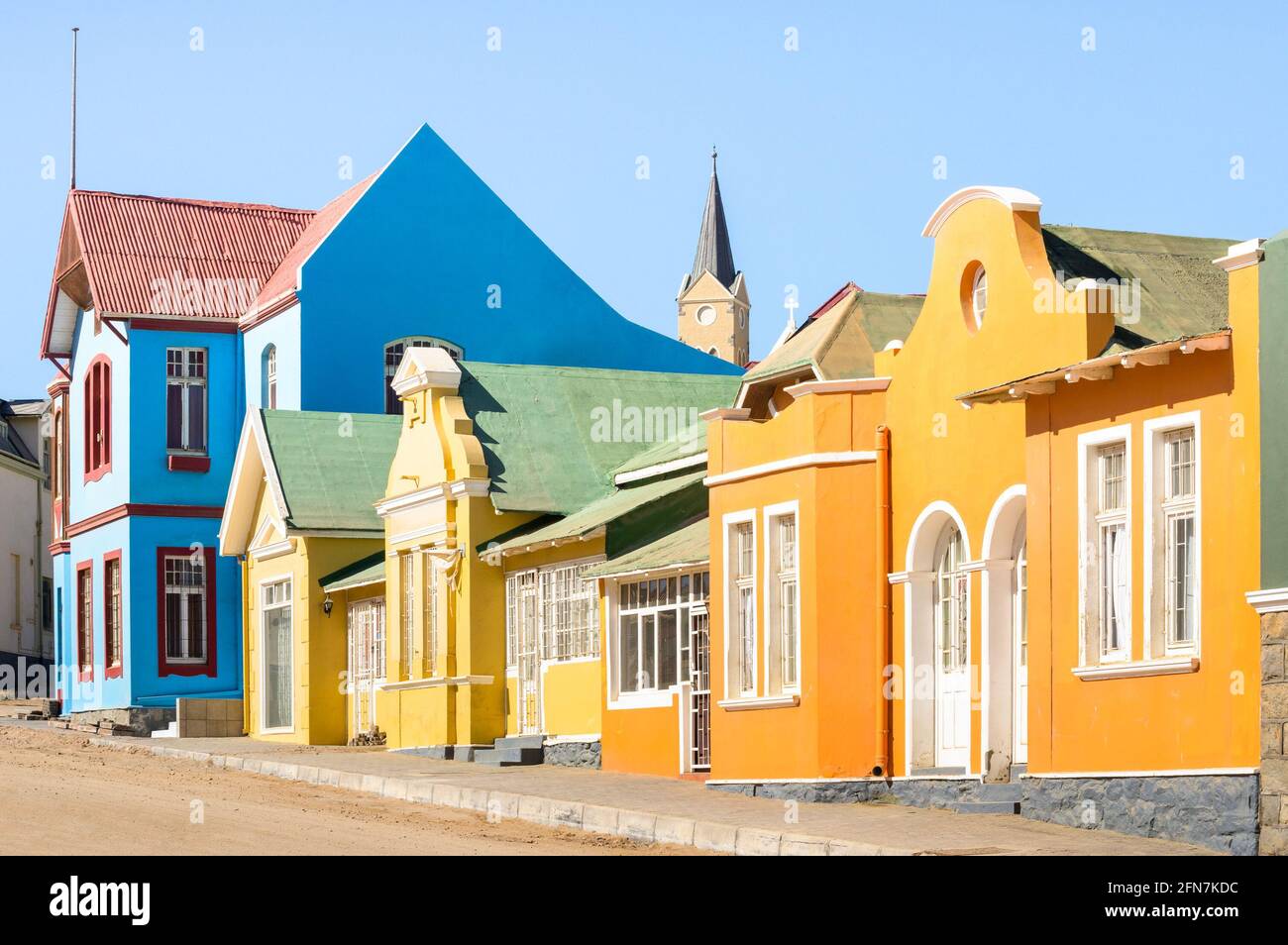 Colorful houses in Luderitz - Architecture concept with ancient german ...