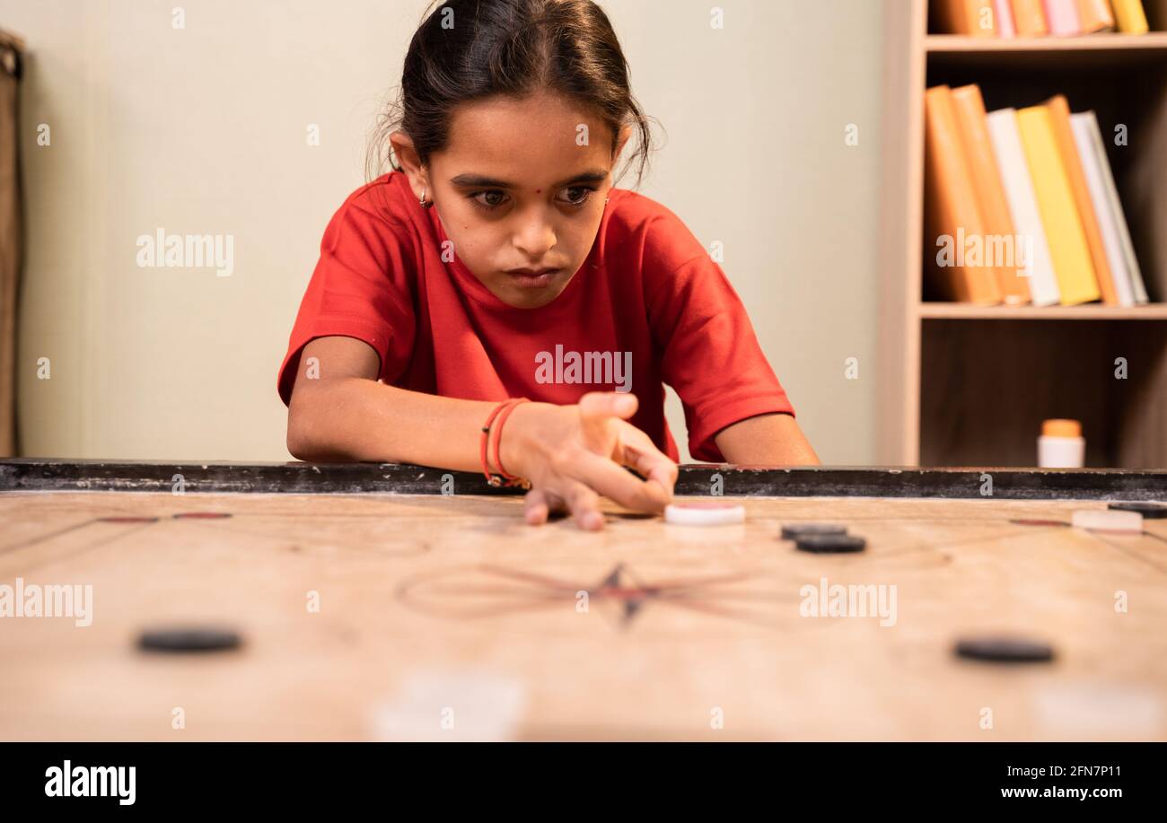 Carrom playing hi-res stock photography and images - Alamy