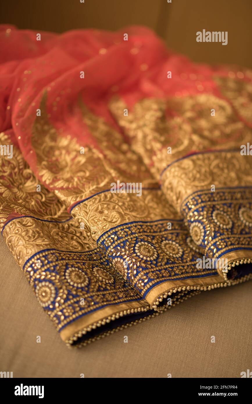 Gold fabric with beautiful patterns Stock Photo - Alamy