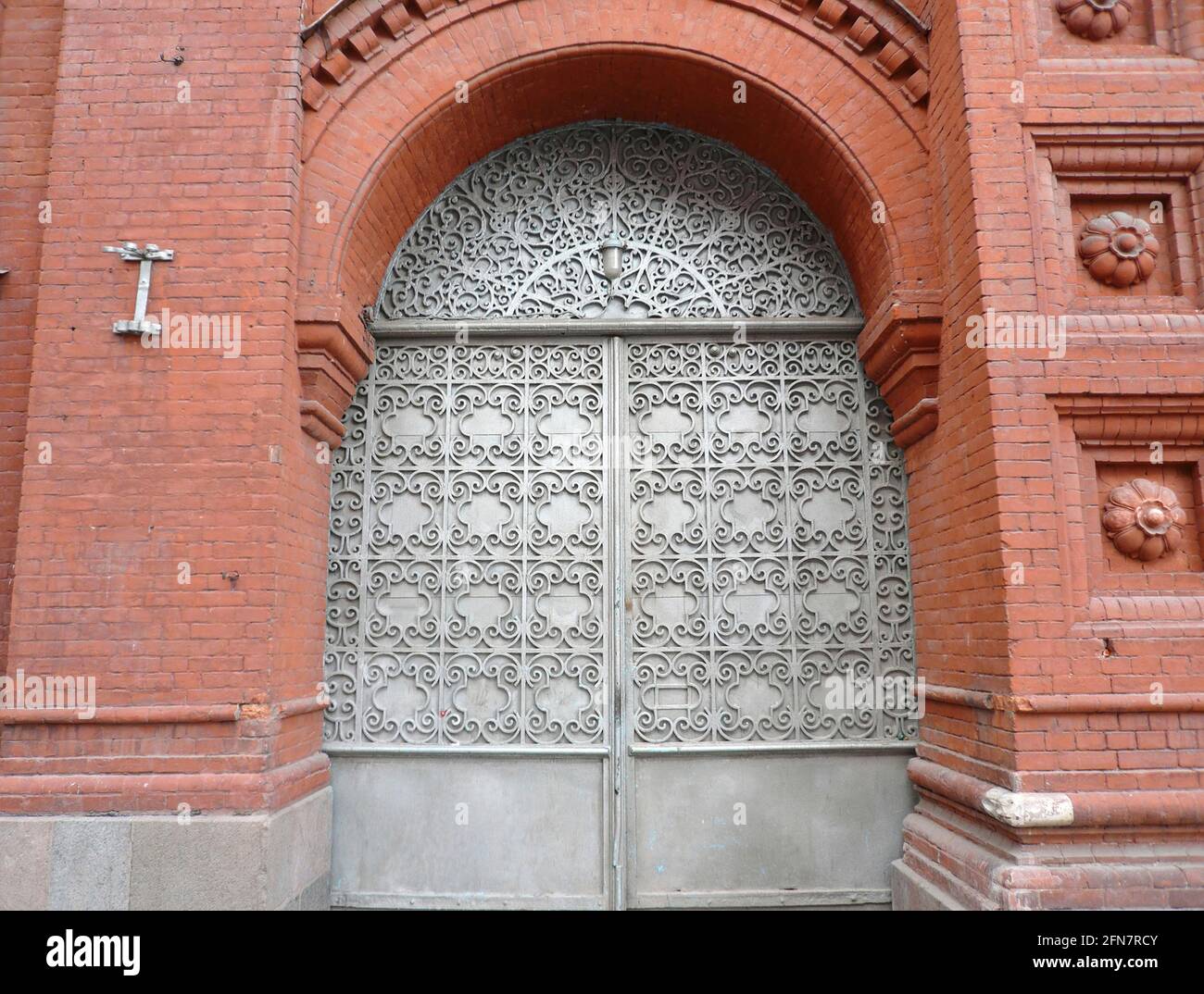 old red brick building with sectile gate Stock Photo - Alamy
