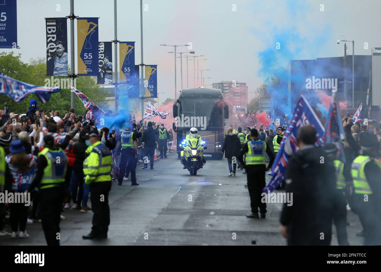 Rangers fans cheer as the team bus arrives outside the ground before ...