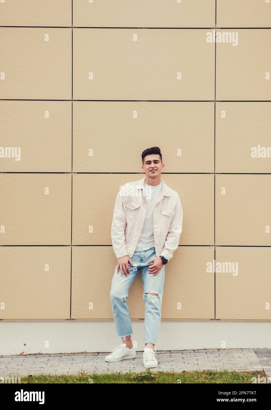 Man wearing white clothes as a fashion style Stock Photo - Alamy