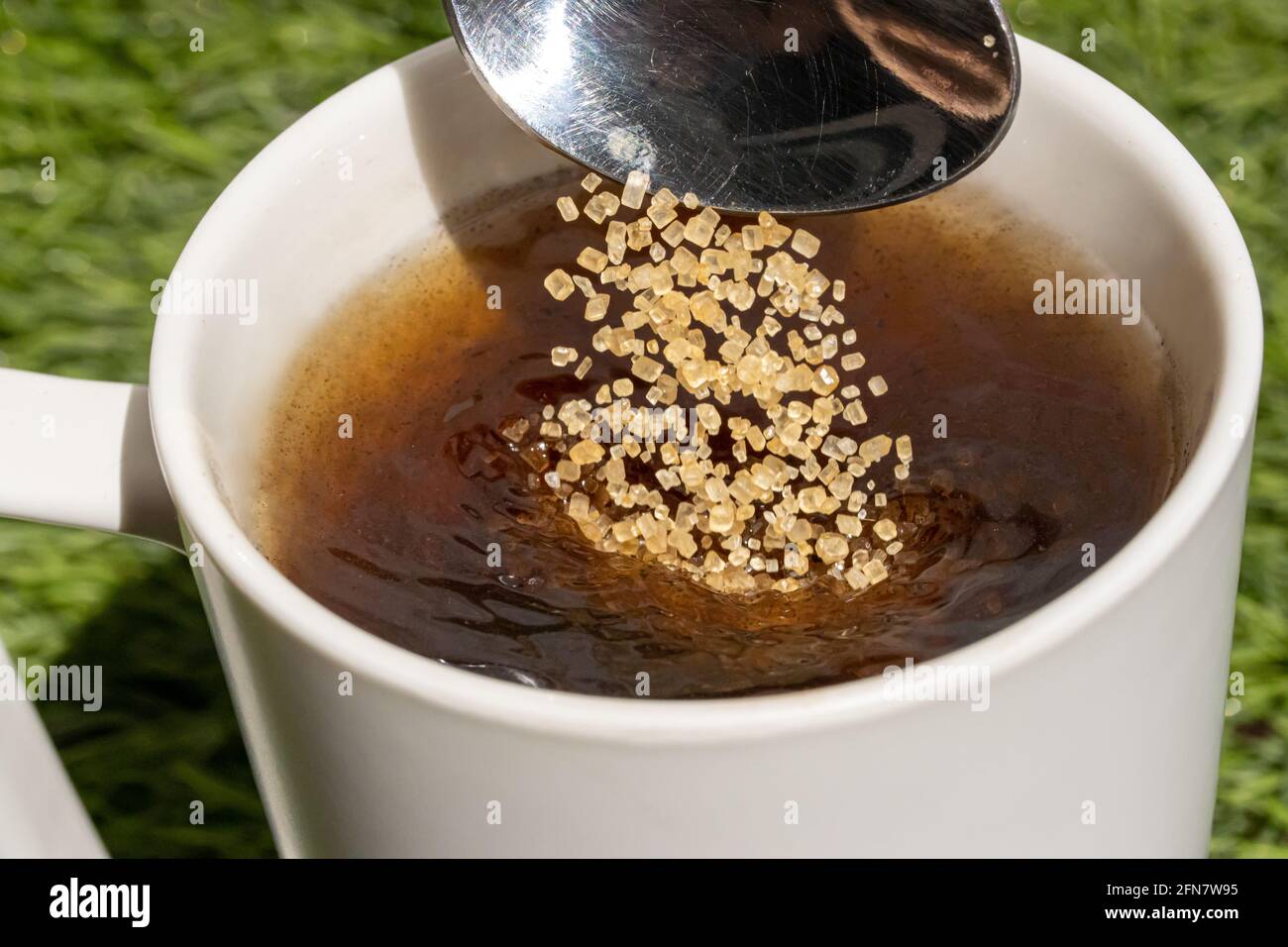 Pouring brown sugar hi-res stock photography and images - Alamy