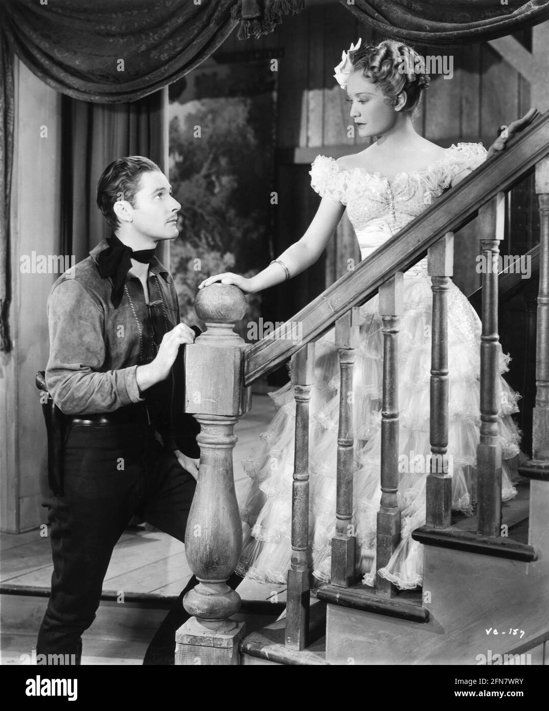 ERROL FLYNN and MIRIAM HOPKINS in VIRGINIA CITY 1940 director MICHAEL ...