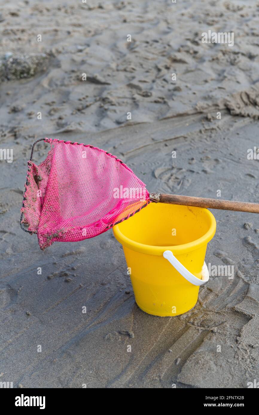 Child's bucket and net hi-res stock photography and images - Alamy