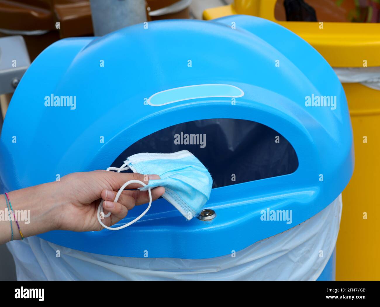 waste collection basket where to throw the used surgical mask and an ...