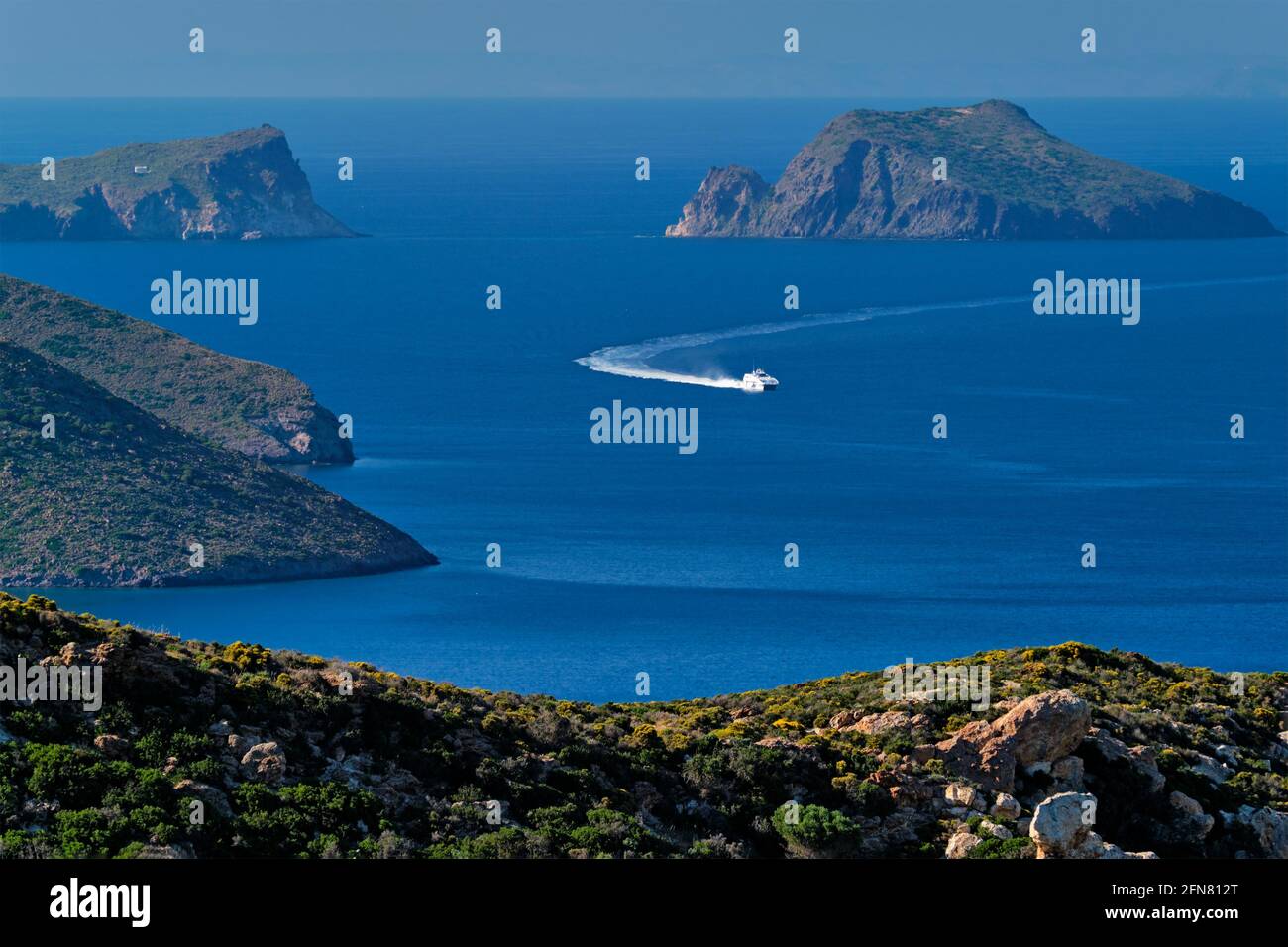 Speeding speed boat catamaran ship in Aegean sea near Milos island in ...
