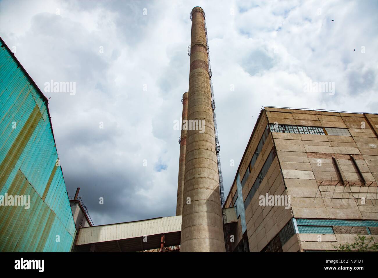 Temirtau, Kazakhstan: Old outdated Soviet cement plant concrete smoking ...