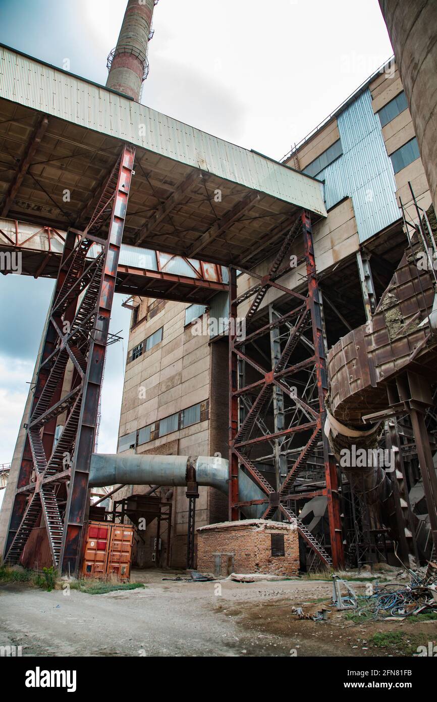 Temirtau, Kazakhstan: Old outdated Soviet cement plant. Conveyor ...