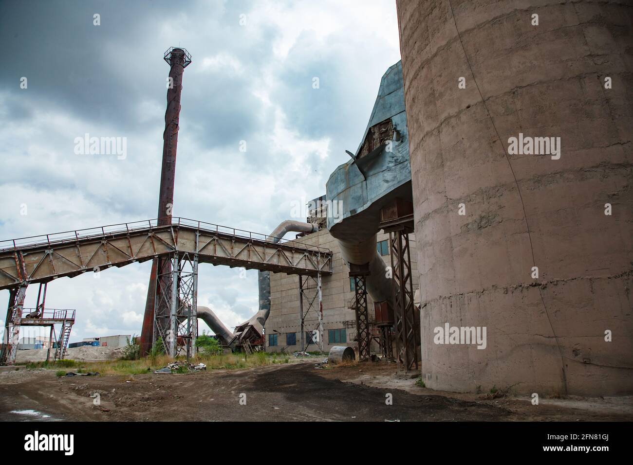 Temirtau, Kazakhstan: Old outdated Soviet cement plant. Cement silo ...