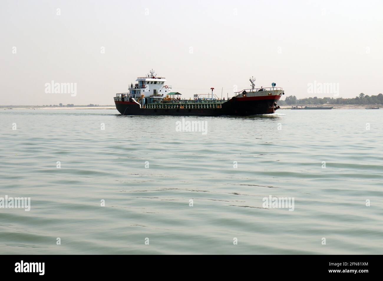 cargo shipping boat on river for product shipment Stock Photo - Alamy