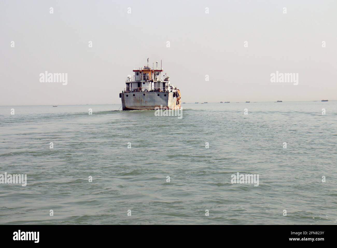 cargo shipping boat on river for product shipment Stock Photo - Alamy
