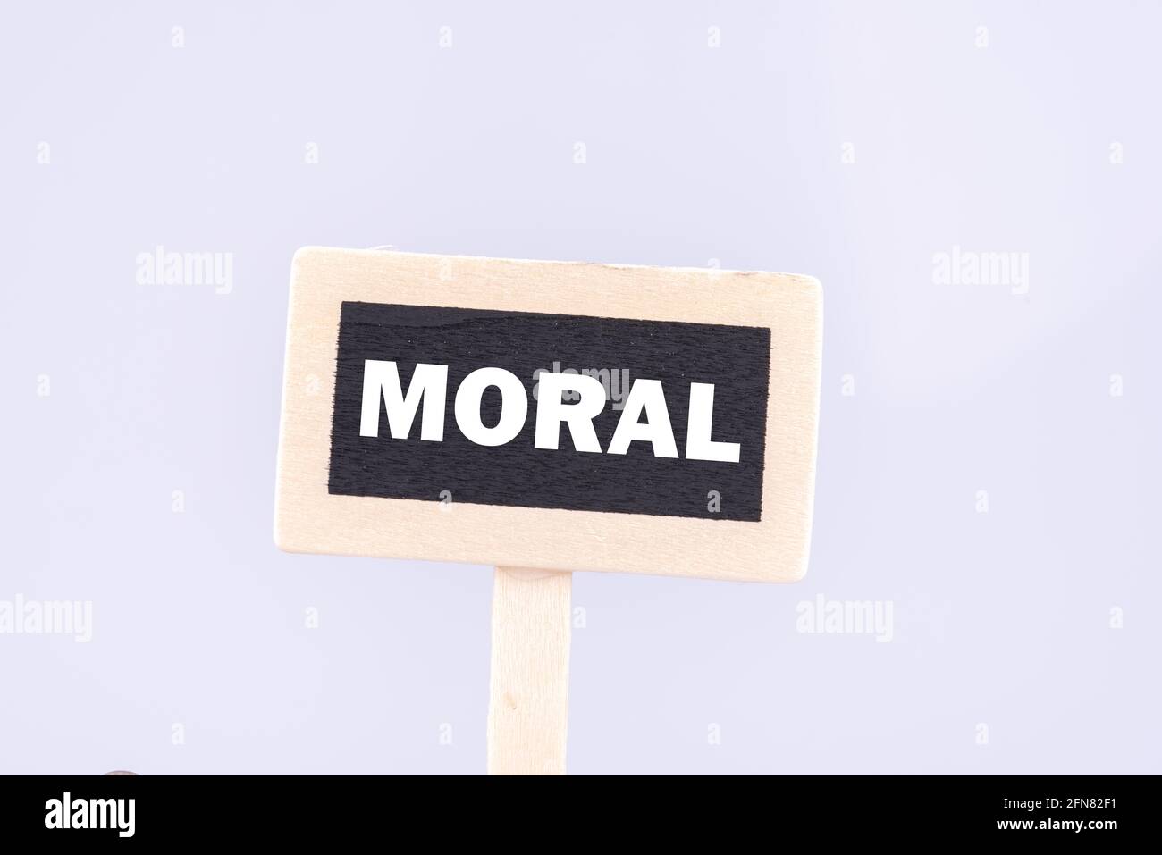 Sign with the text 'moral' isolated on a white background Stock Photo ...