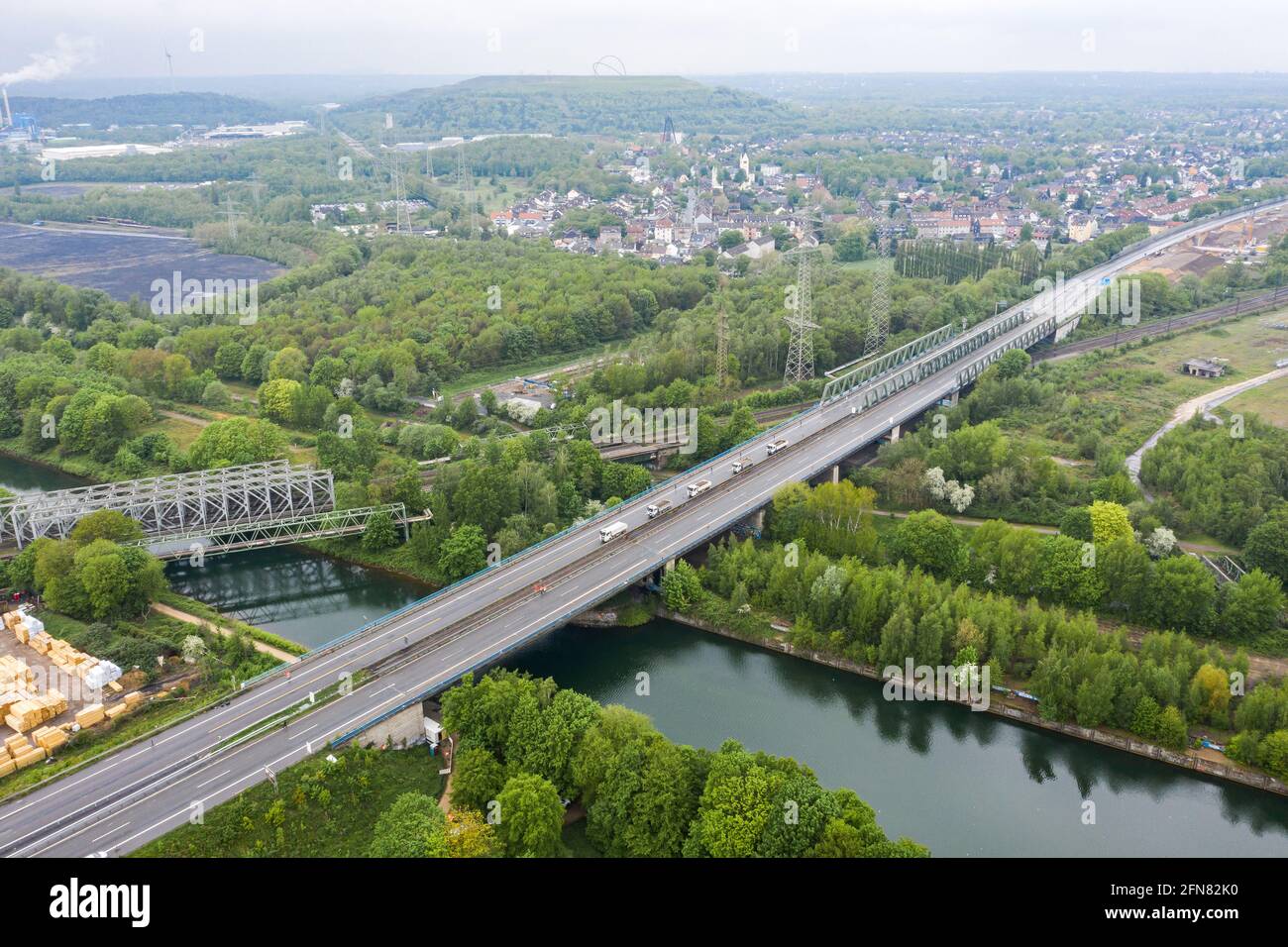 Herne, Germany. 15th May, 2021. Trucks park on the damaged A43 ...