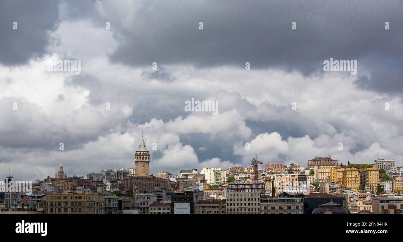 city view in front of cloudy skies background Stock Photo - Alamy
