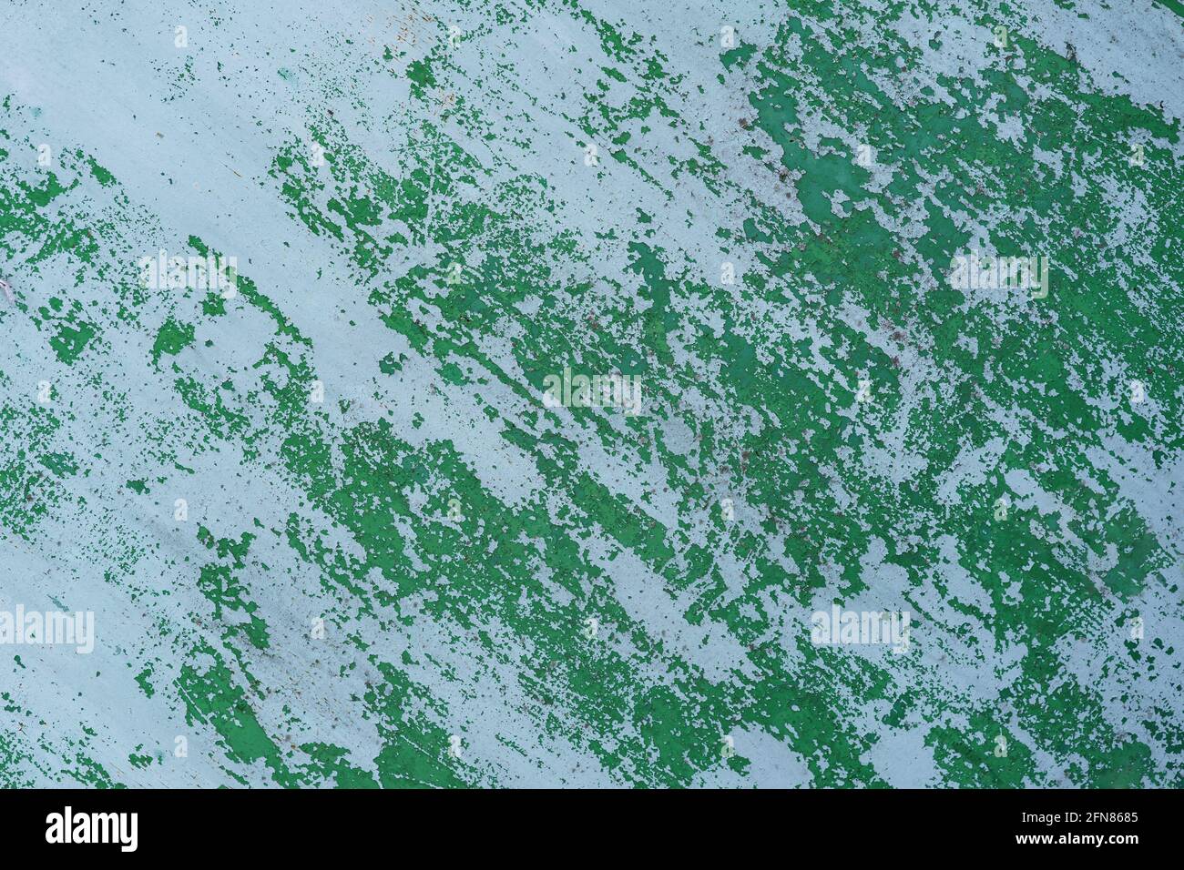 Painted in green old cracked metal rusted background. Metal texture ...