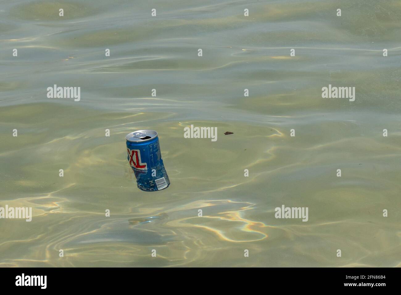 Tel Aviv, Israel - April 15th, 2021: An empty soft drink can, floating ...