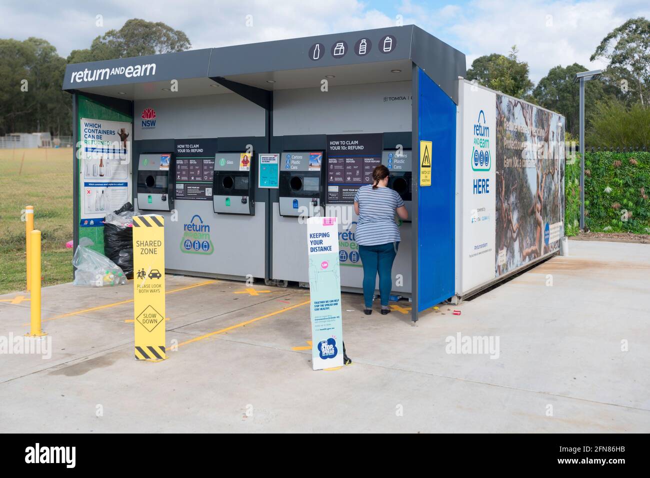 A set of Return and Earn reverse vending machines at Rouse Hill in ...