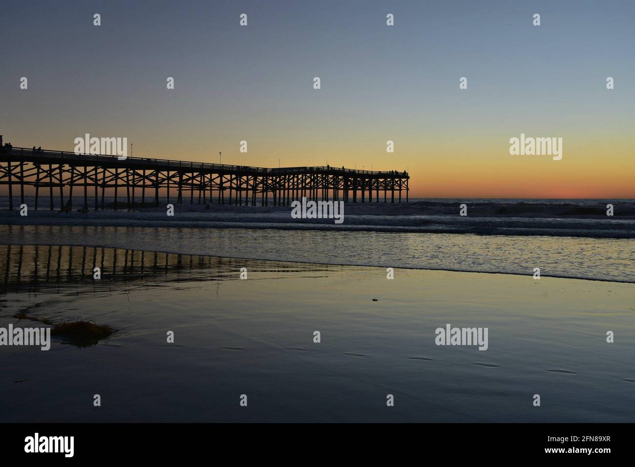 Sunset seascape with panoramic view of Crystal Pier in Pacific Beach ...