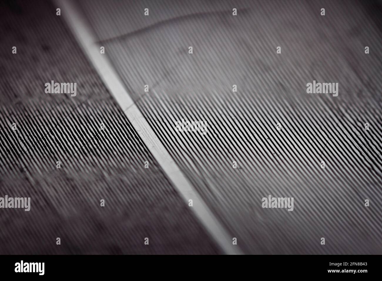 Macro shot of black vinyl record showing scratches. Surface of an old ...