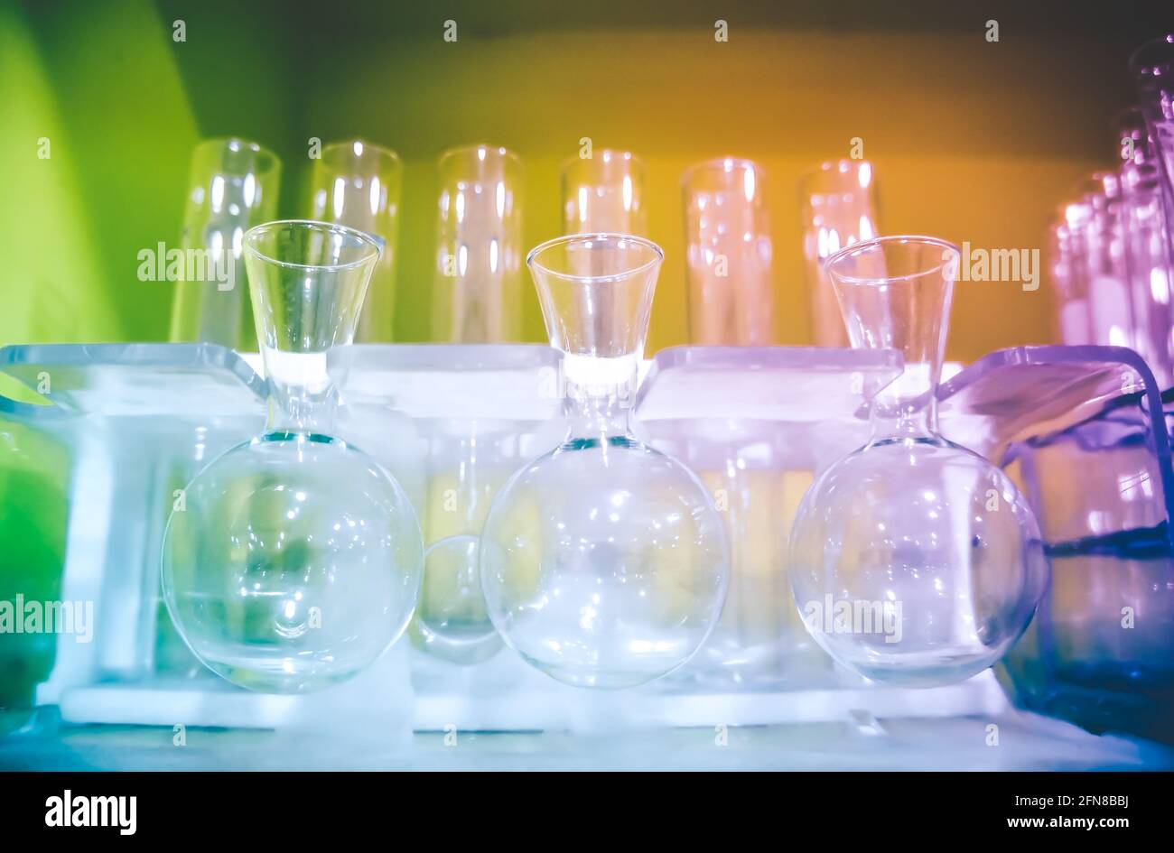 Group of chemical laboratory glassware equipment. Empty test tubes or ...