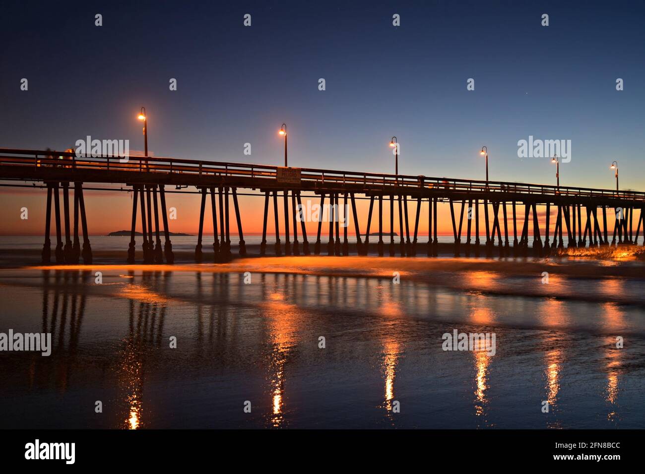 Sunset seascape with panoramic view of Imperial Beach Pier in San Diego ...