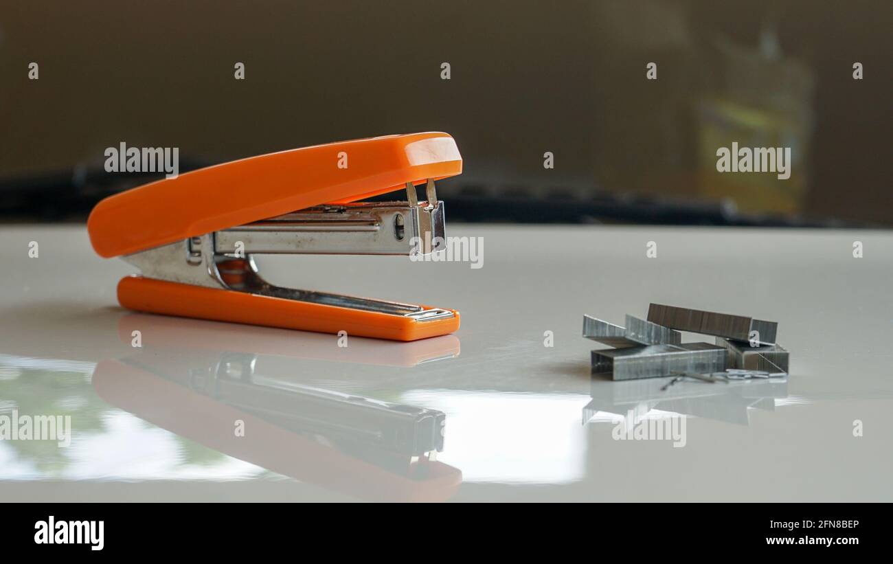 Stapler pins hi-res stock photography and images - Alamy