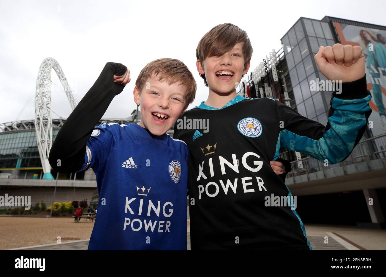 Leicester City fans Rocco and Charlie Vine pose for a photo outside ...