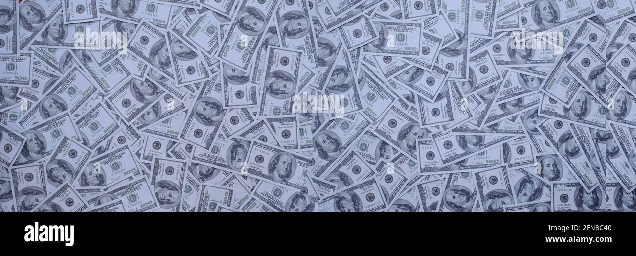 Group of money stack of 100 US dollars banknotes a lot of the ...