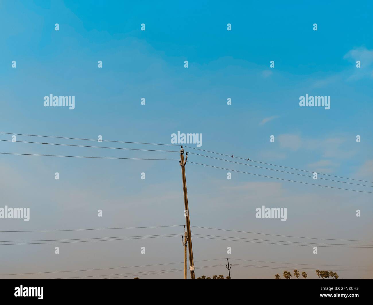 electric poll with sky background Stock Photo - Alamy