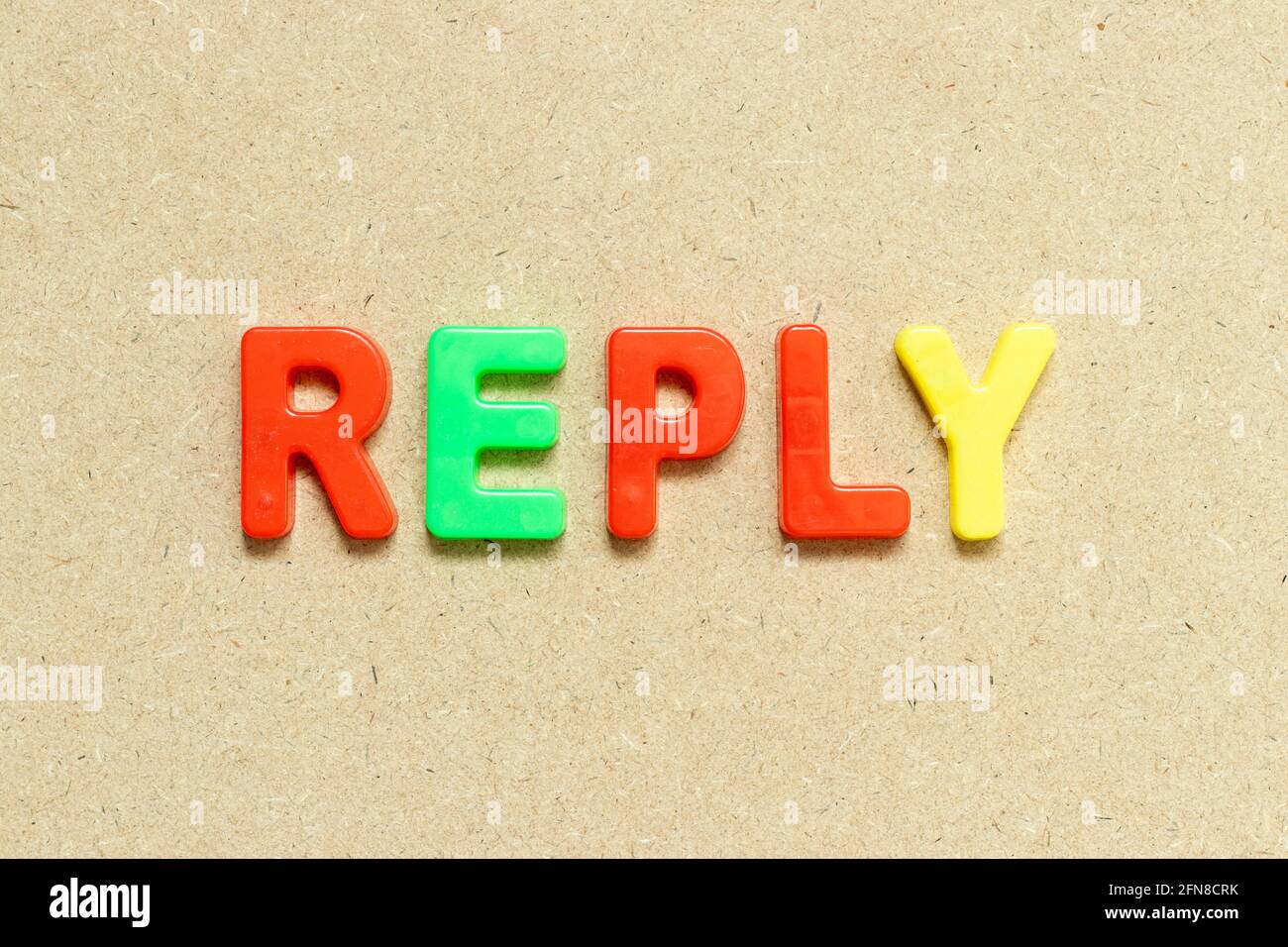Color alphabet letter with word reply on wood background Stock Photo ...
