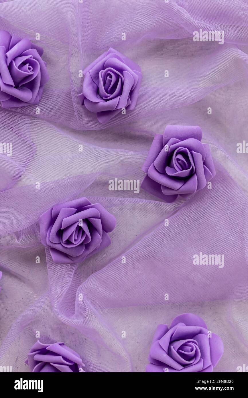 fake purple roses on chiffon fabric in purple or lilac color for ...