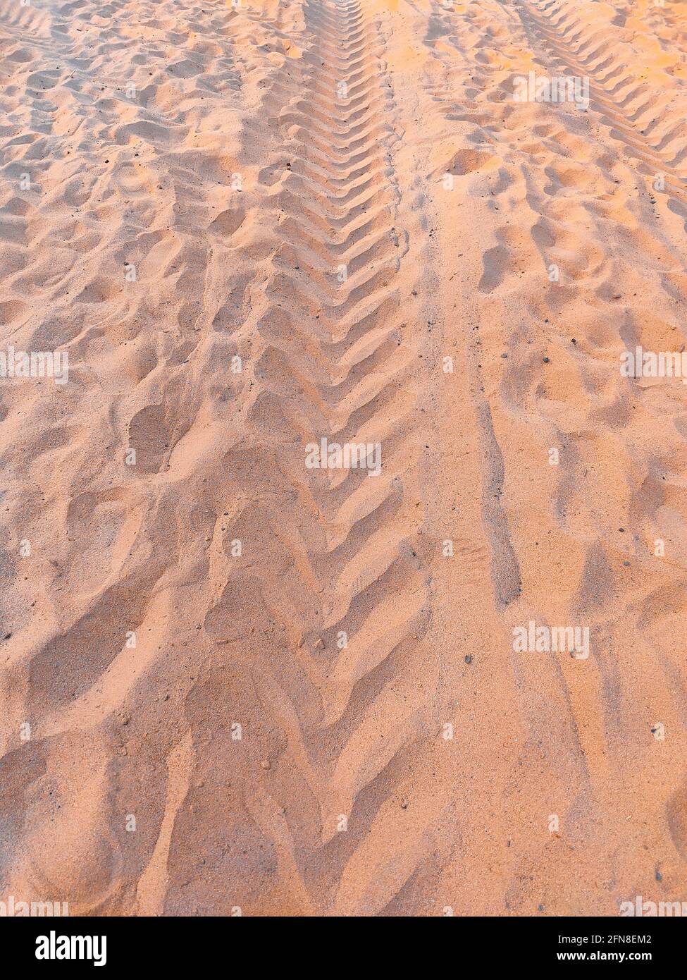 tracks wheels marks in sand field land Stock Photo - Alamy