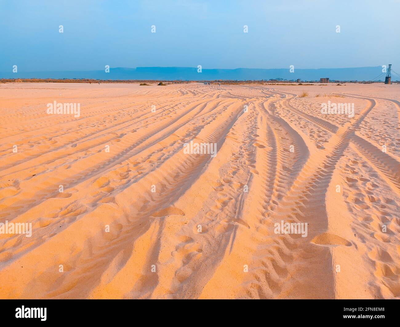 tracks wheels marks in sand field Stock Photo - Alamy