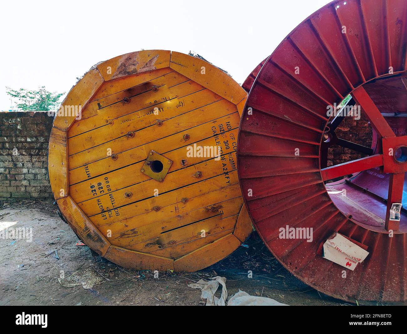a big wooden wire wheel Stock Photo - Alamy