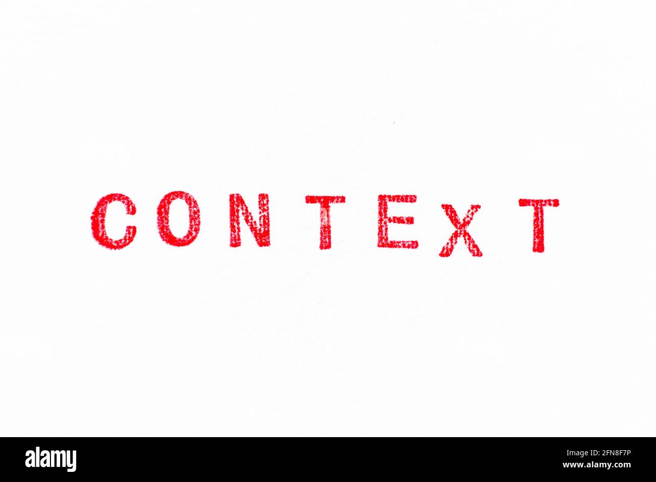 Red color rubber stamp in word context on white paper background Stock ...