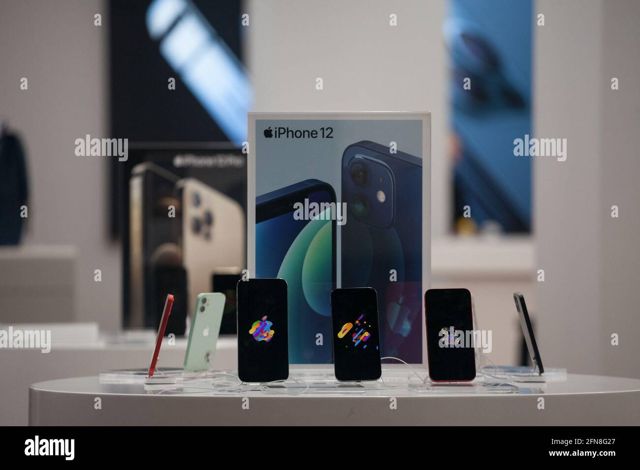 Picture of various models of iPhone 12 for sale in an apple store of ...