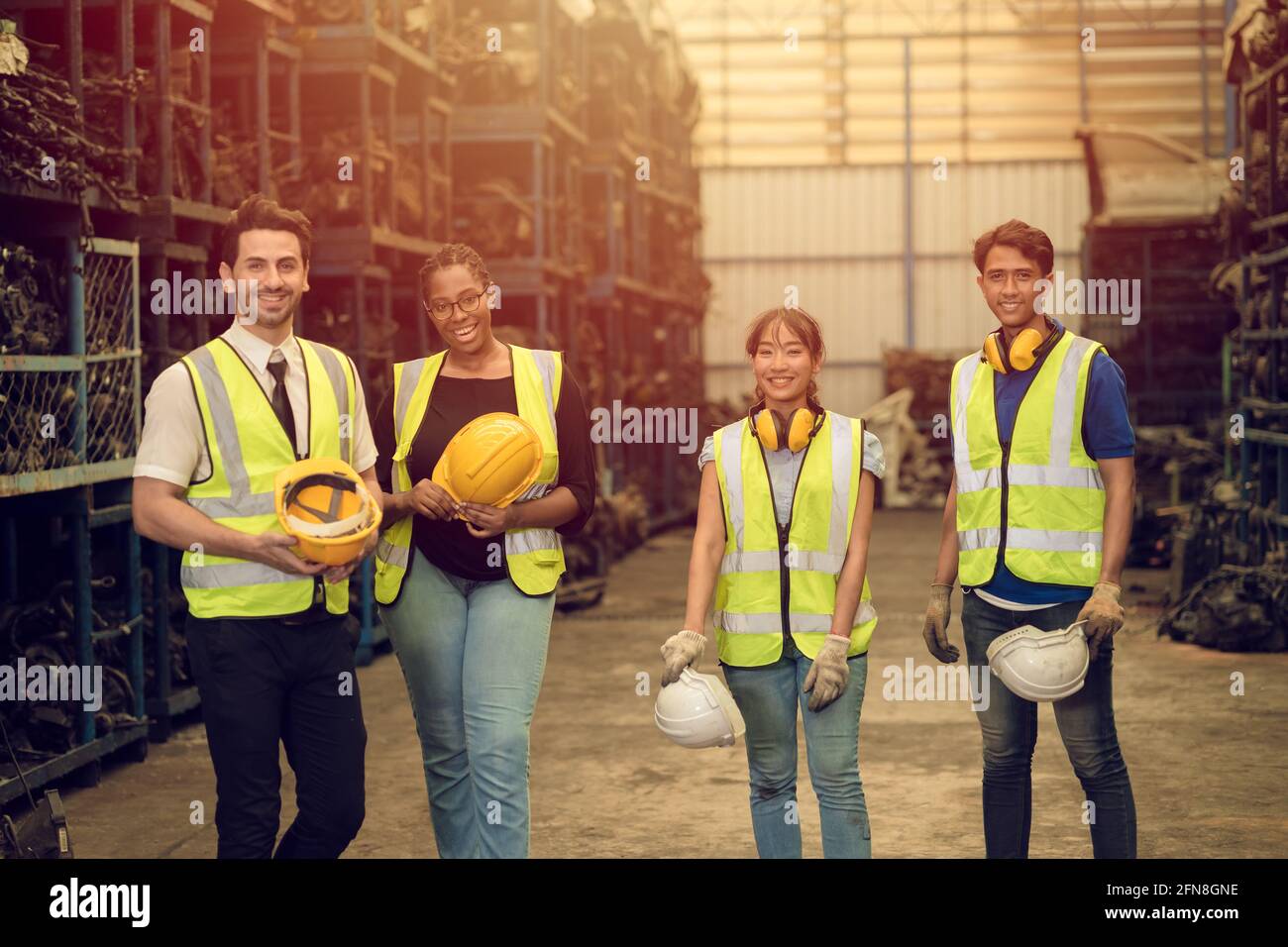 Group of Teamwork Worker mix race enjoy team working in heavy industry ...