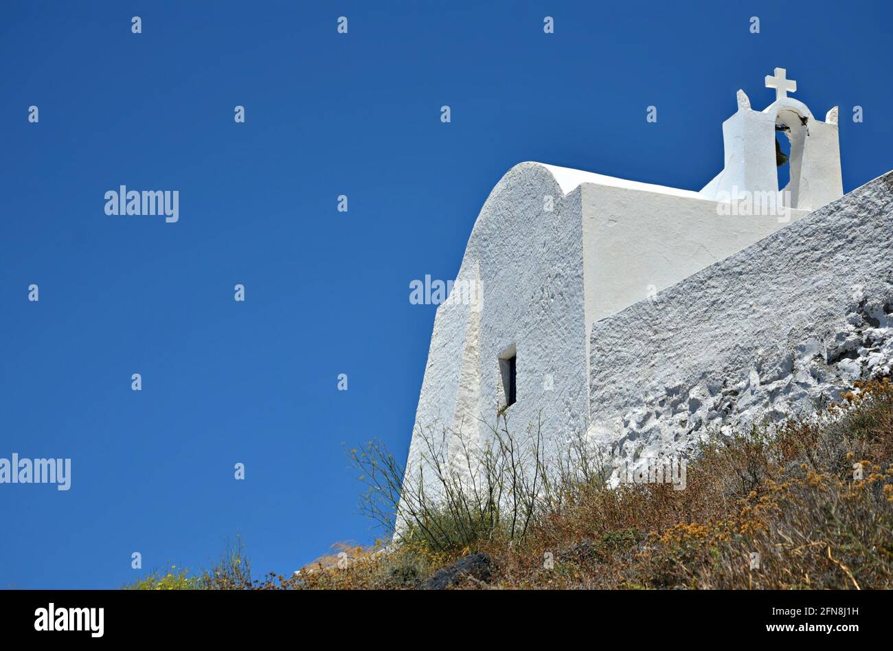 Landscape with a picturesque whitewashed Greek Orthodox chapel in ...