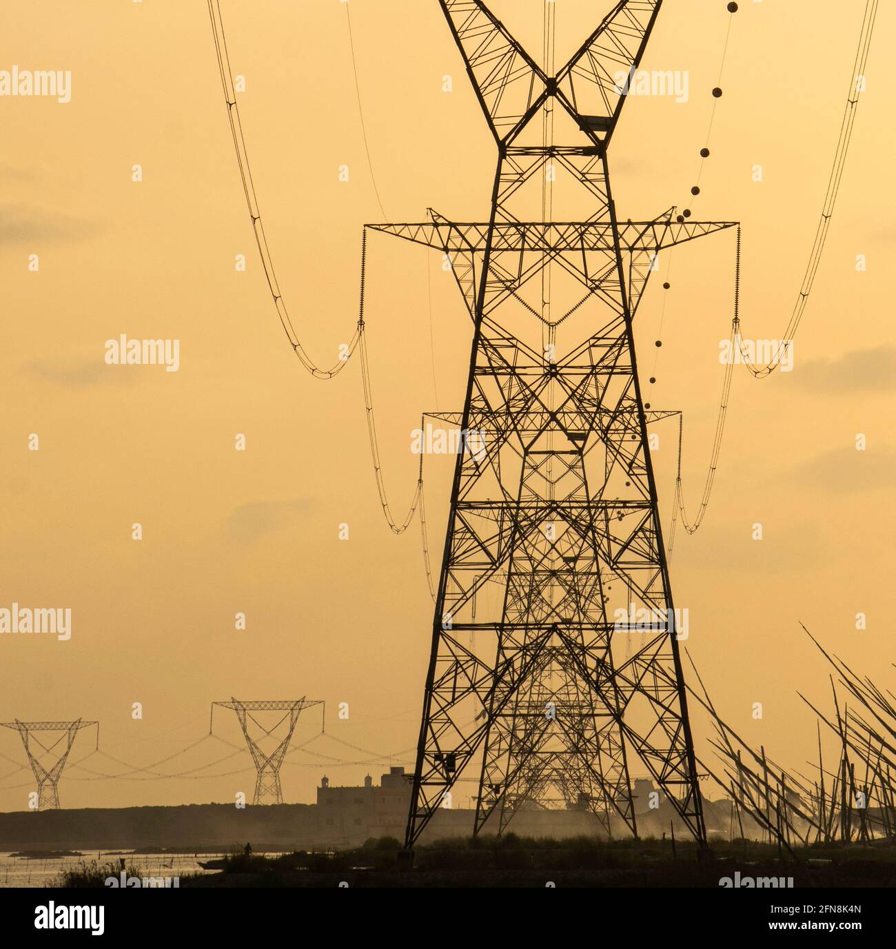 Electric energy transmission by high voltage power lines Stock Photo ...