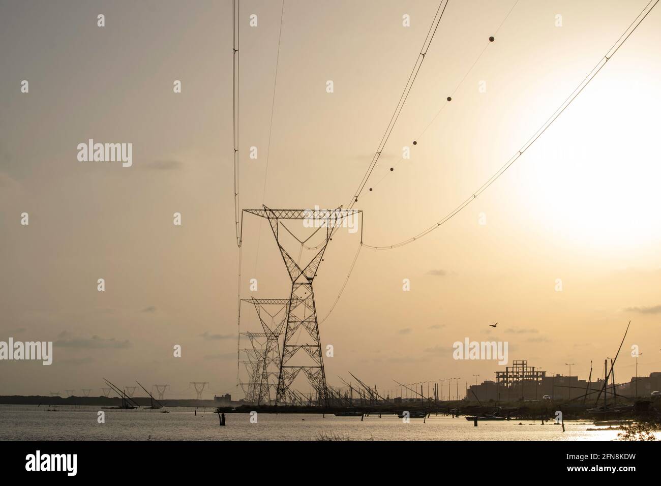 Electric energy transmission by high voltage power lines Stock Photo ...
