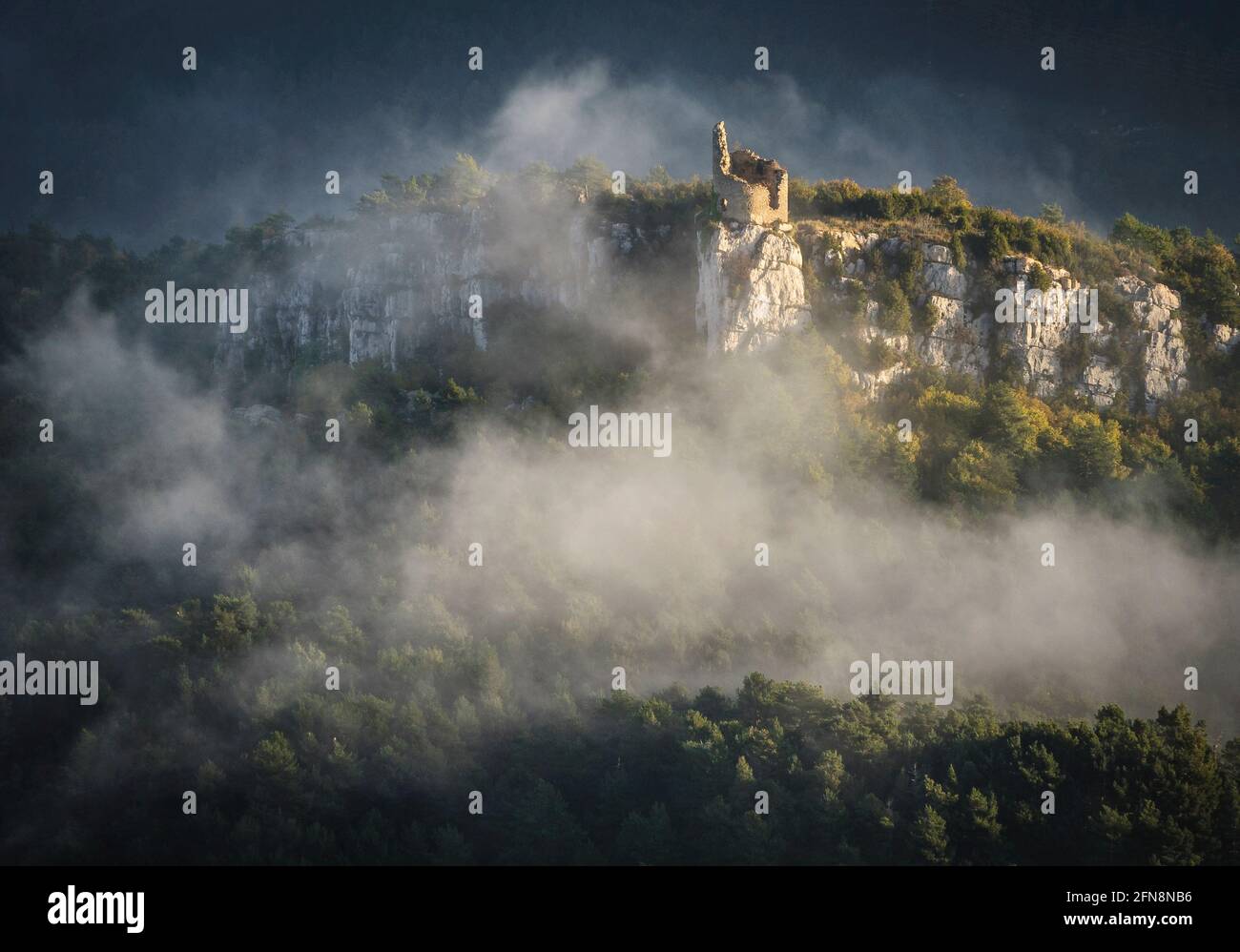 Blancafort castle, between fogs, at sunrise (Berguedà, Catalonia, Spain ...