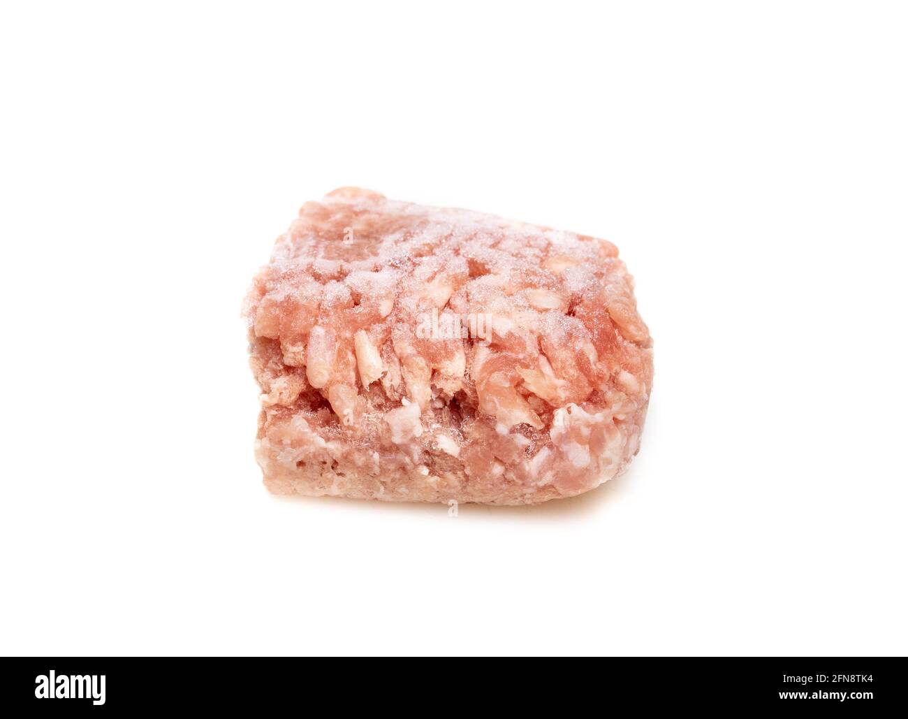Frozen medium ground pork. Small portioned out ground lean pork meat ...