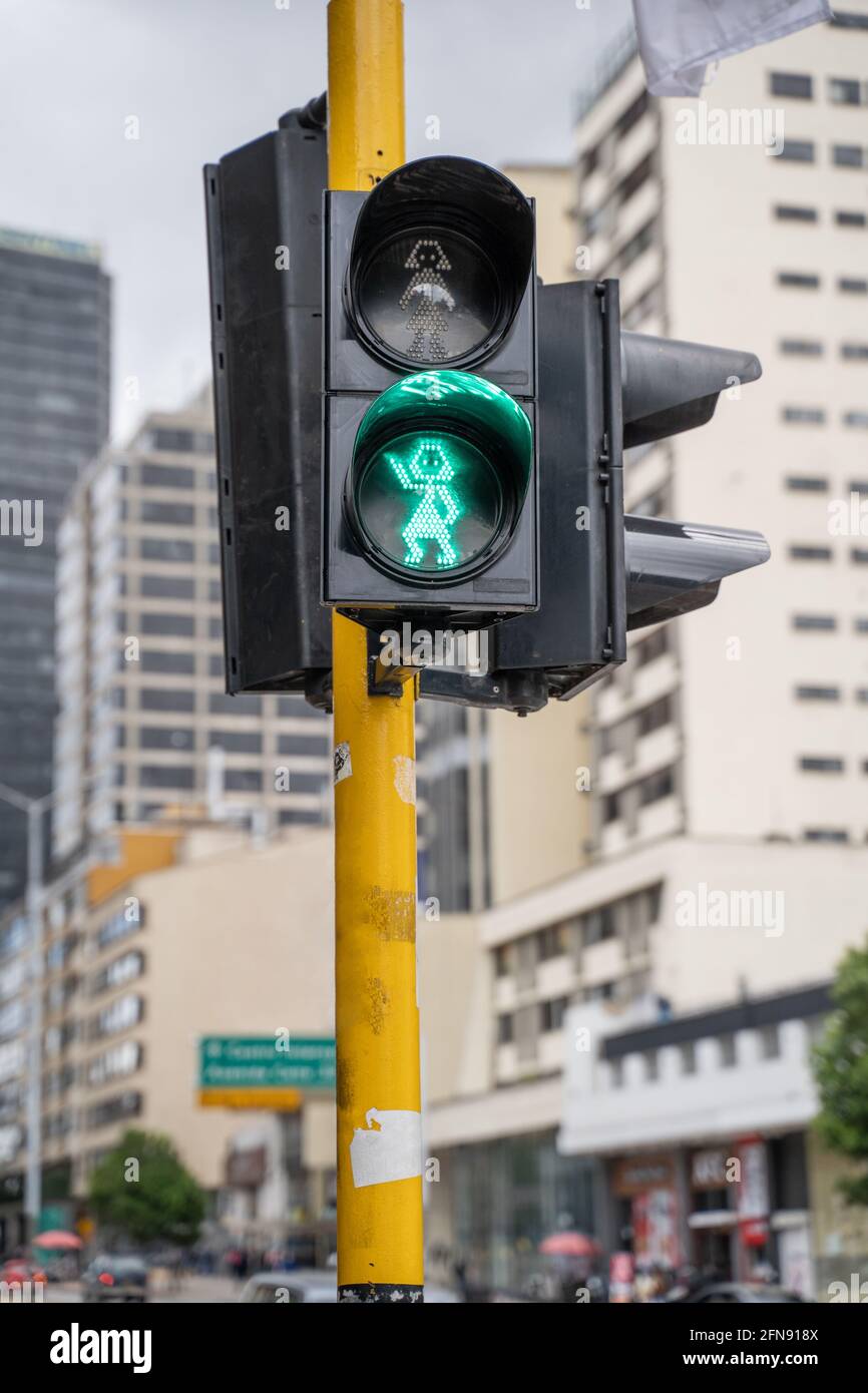 Female pedestrian crossing signal hi-res stock photography and images ...