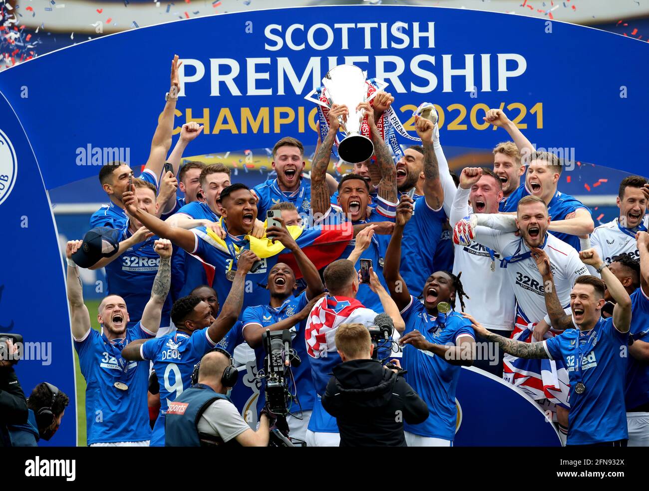 Rangers' James Tavernier lifts the trophy as he celebrates winning the ...