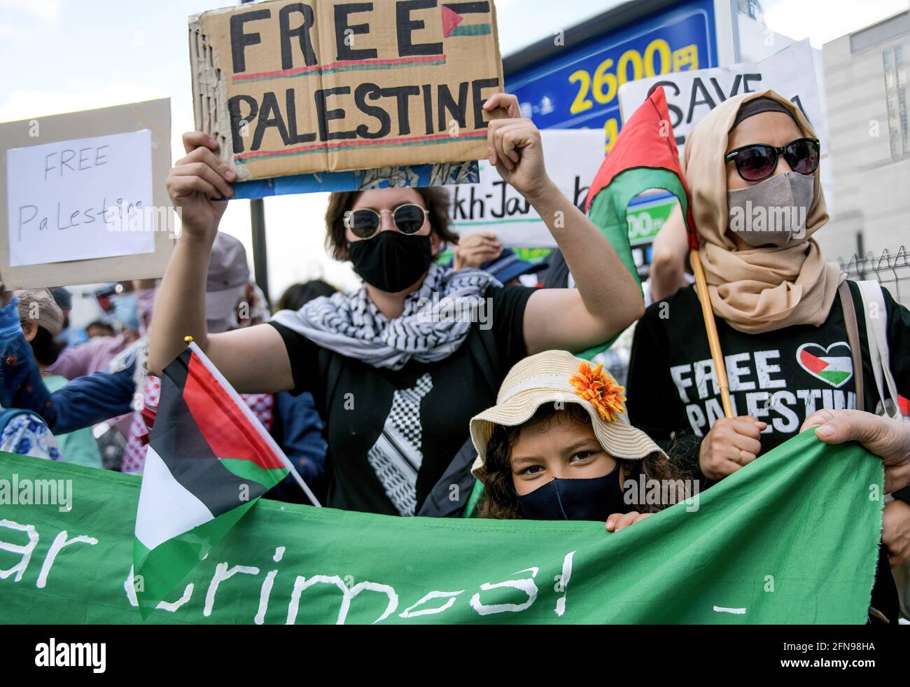 Tokyo, Japan. 15th May, 2021. A pro-Palestinian activist holds a ...