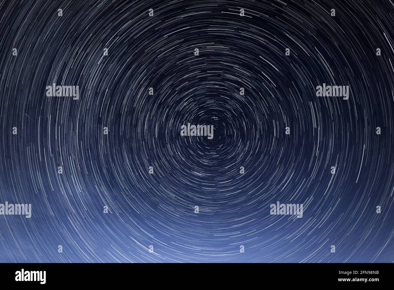 Stellar trails, the rotation of bright stars at night around the Polar ...