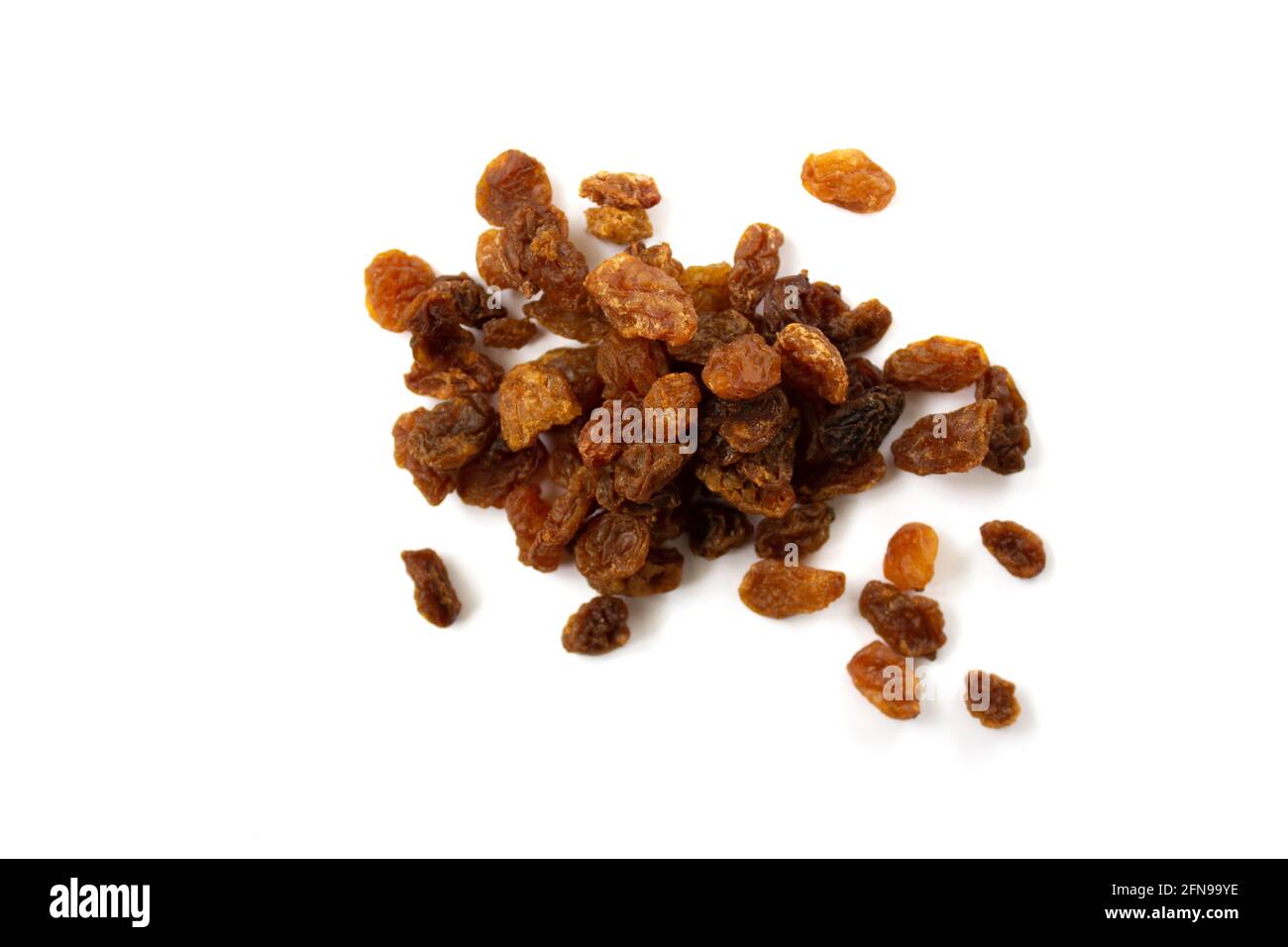 handful of dry raisins on white isolated background Stock Photo - Alamy